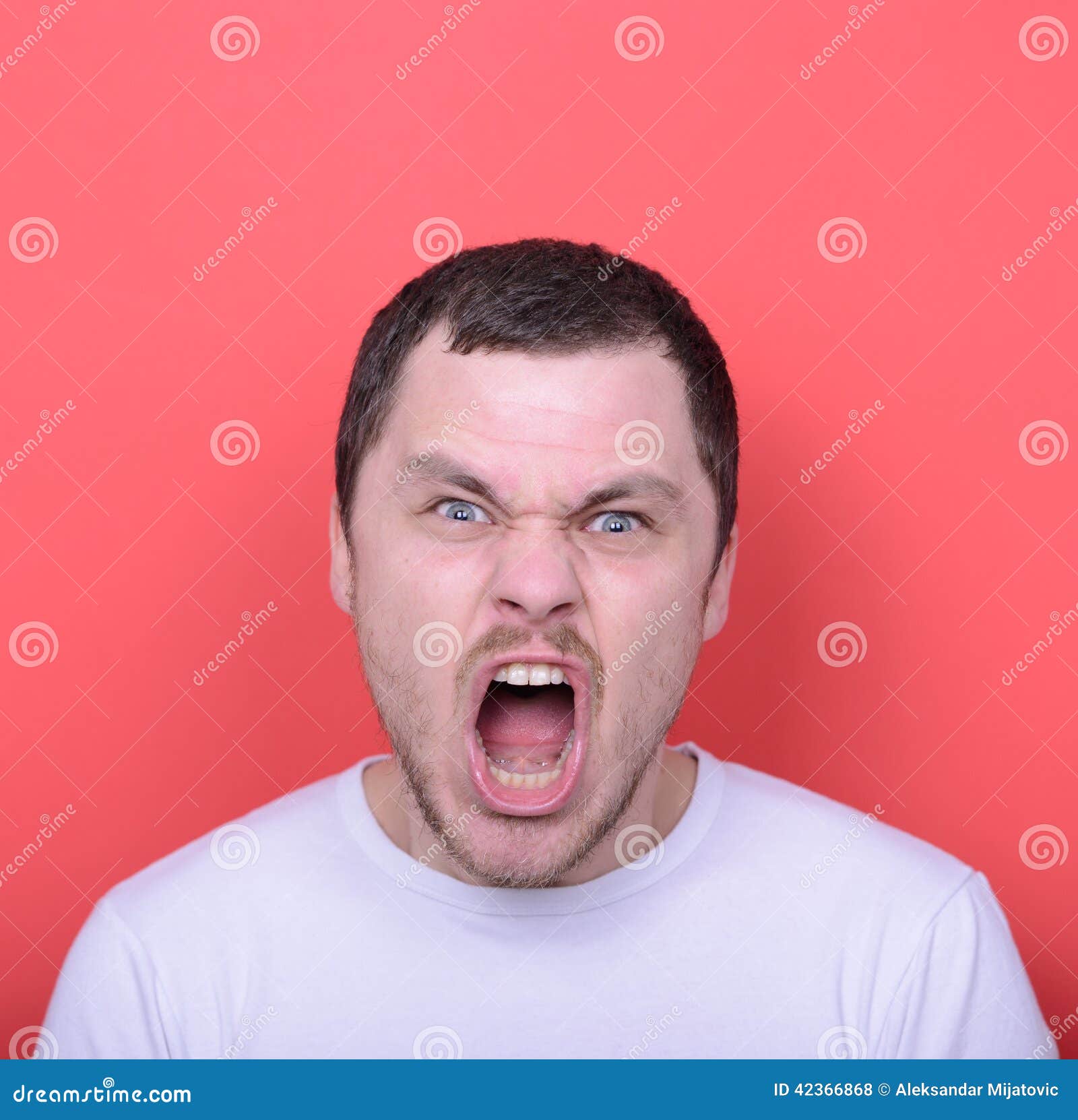 Portrait of Angry Man Screaming Against Red Background Stock Photo ...