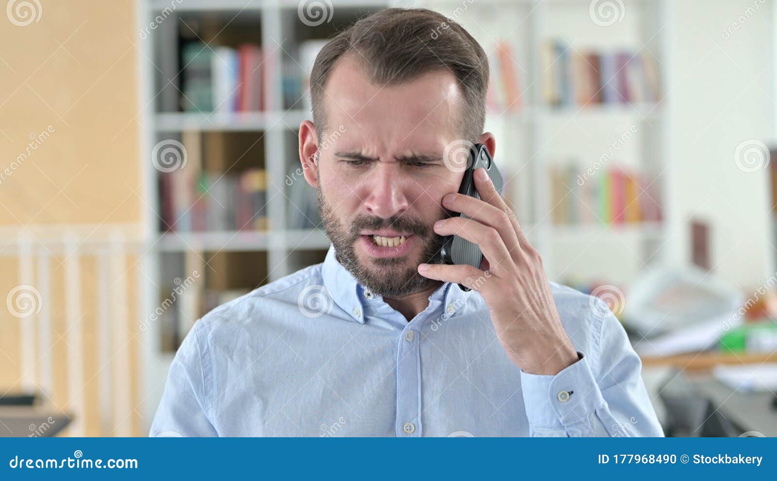 Portrait of Angry Young Man Fighting on Smartphone Stock Photo - Image ...