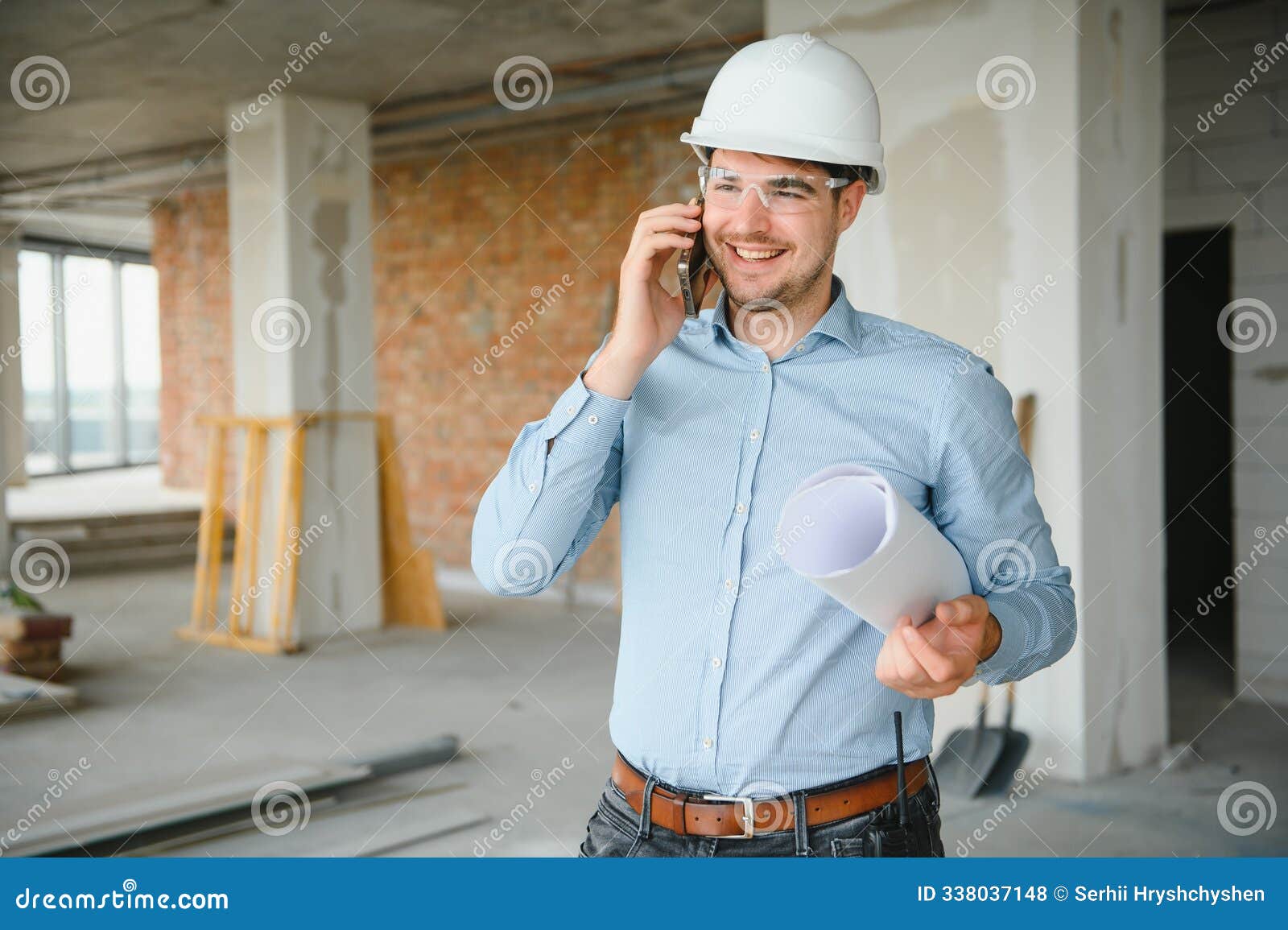 Portrait of an Architect Builder Studying Layout Plan of the Rooms ...