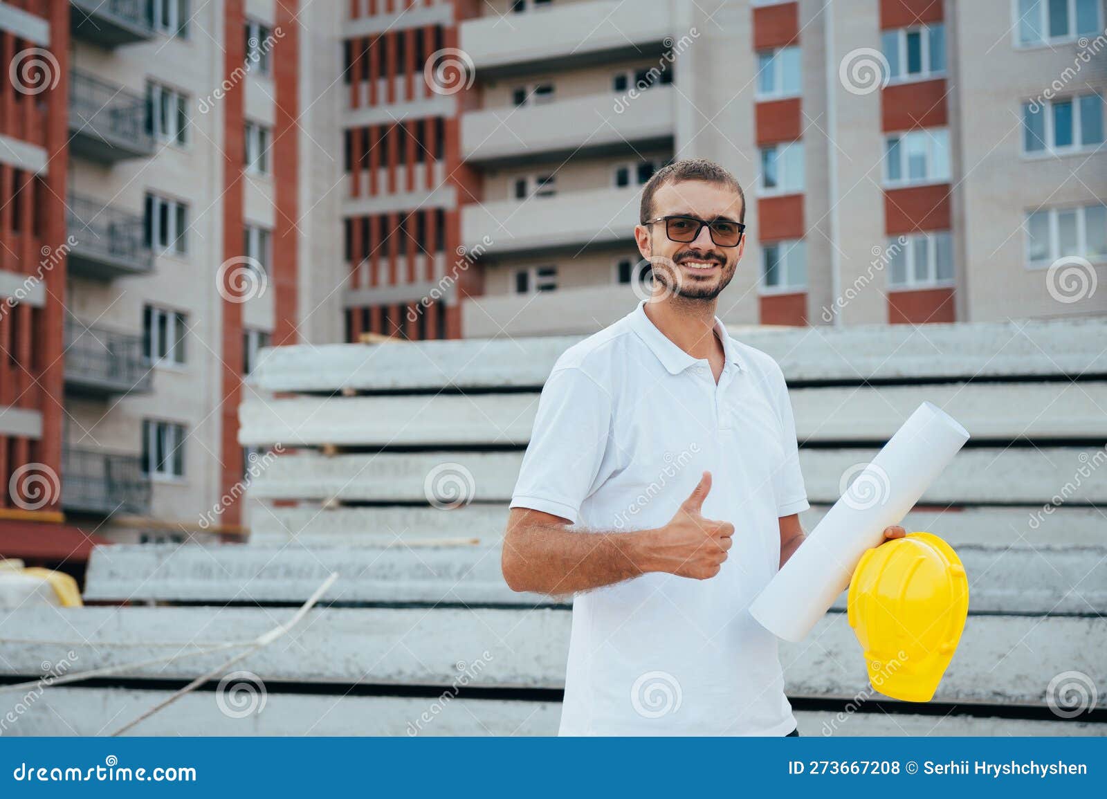 Portrait of an Architect Builder Studying Layout Plan of the Rooms ...