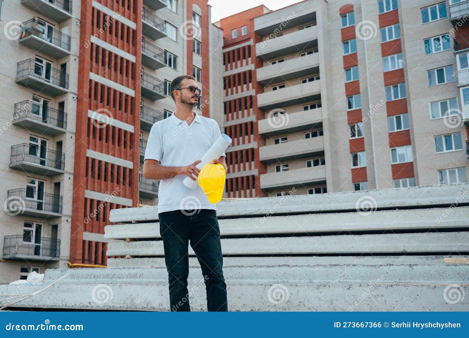 Portrait of an Architect Builder Studying Layout Plan of the Rooms ...