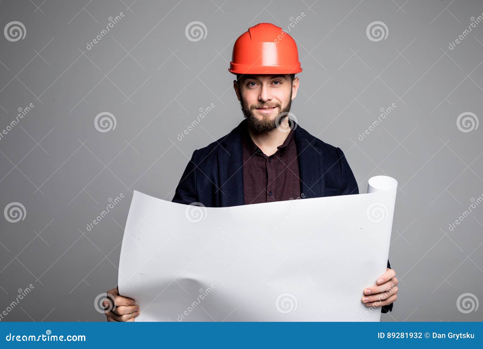 Portrait of an Architect Builder Studying Layout Plan of the Rooms ...
