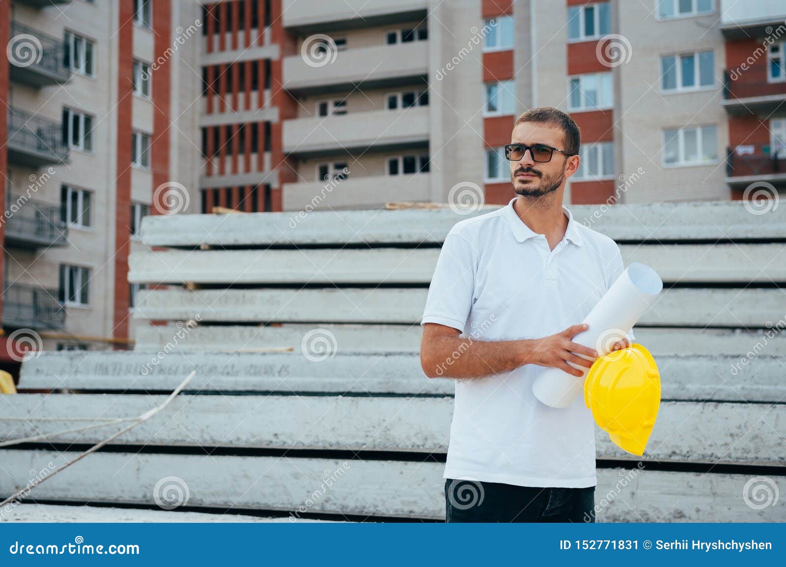 Portrait of an Architect Builder Studying Layout Plan of the Rooms ...