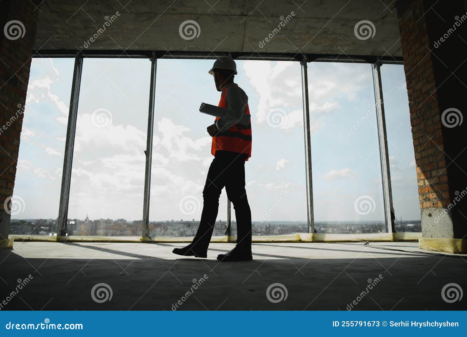 Portrait of an Architect Builder Studying Layout Plan of the Rooms ...