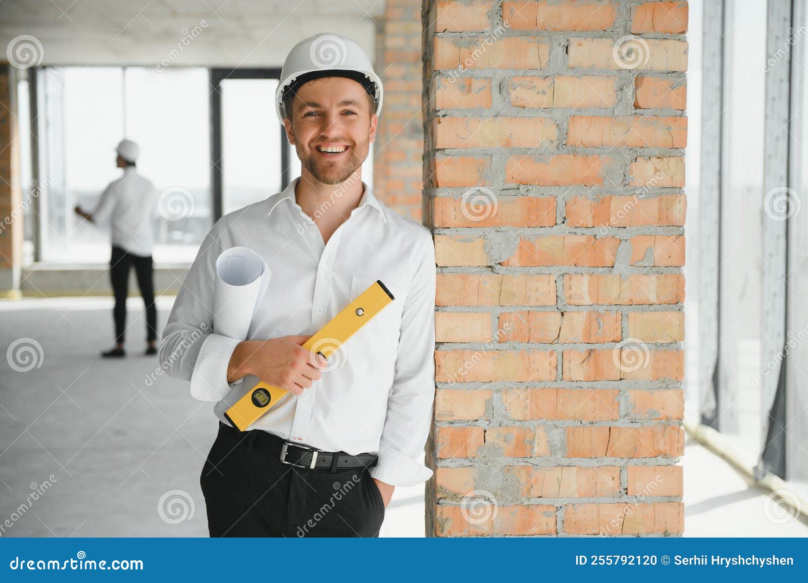 Portrait of an Architect Builder Studying Layout Plan of the Rooms ...