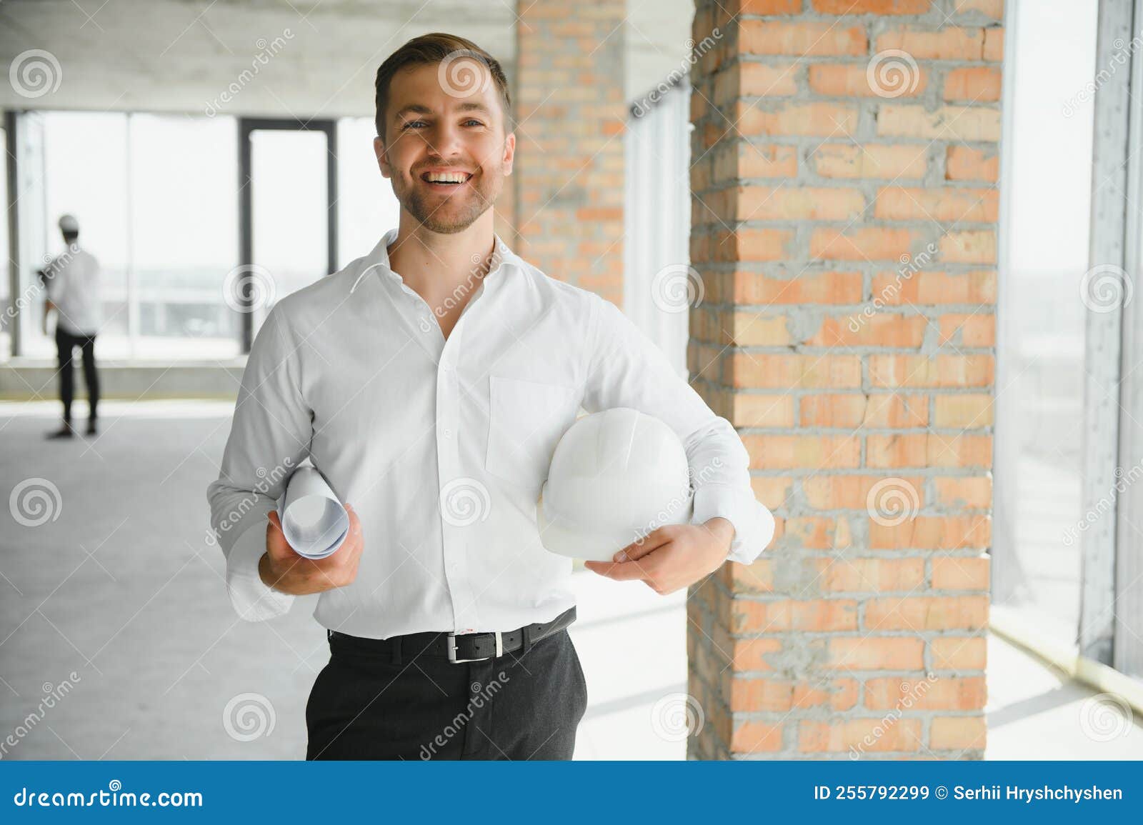 Portrait of an Architect Builder Studying Layout Plan of the Rooms ...