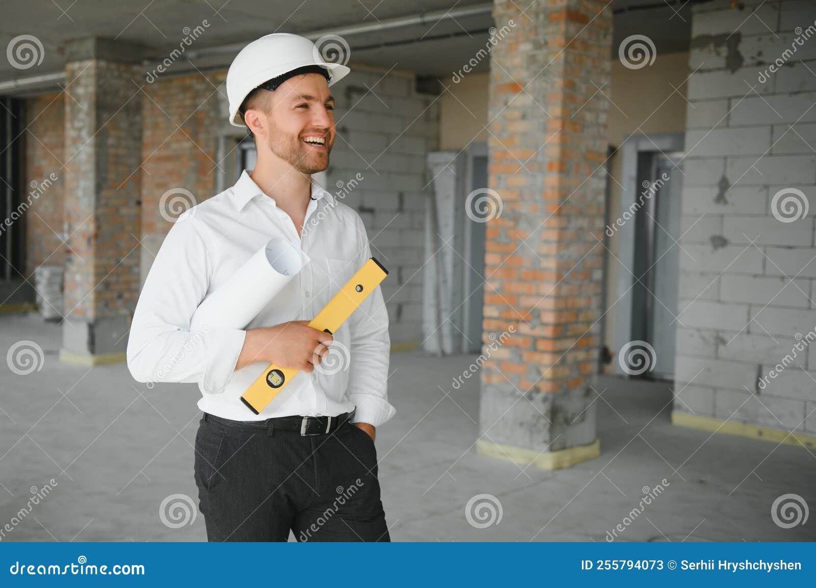 Portrait of an Architect Builder Studying Layout Plan of the Rooms ...