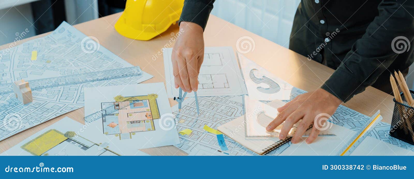 Architect Using Divider To Measure Blueprint. Focus on Hand ...