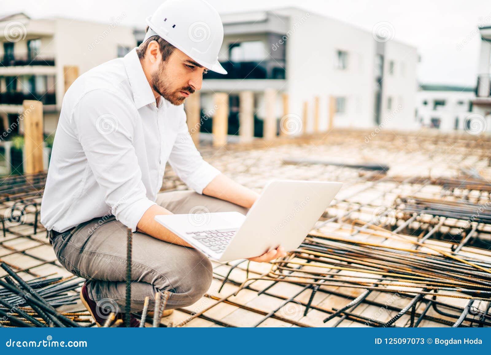 Architect Using Laptop for Construction Site. Worker on Site Stock ...