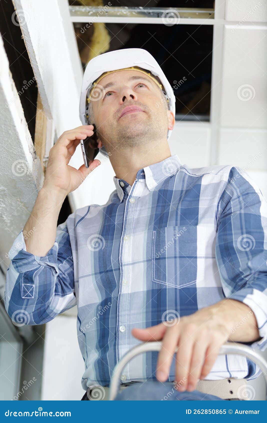 Portrait Architect Using Mobile Phone on Ladder Stock Image - Image of ...