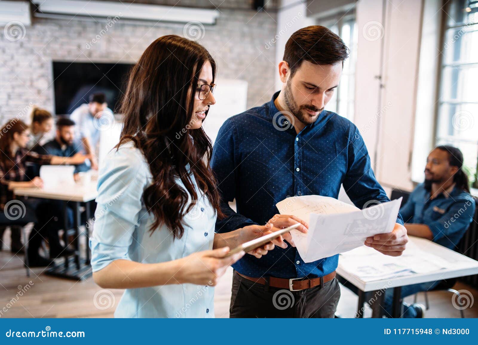 Portrait of Architects Having Discussion in Office Stock Photo - Image ...