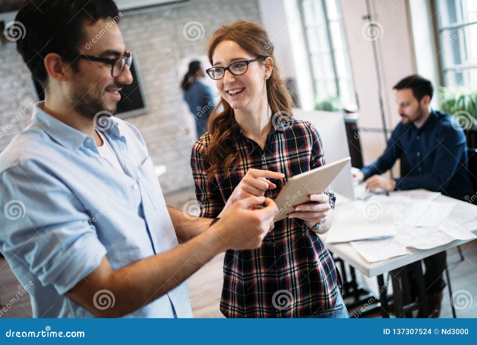 Portrait of Architects Having Discussion in Office Stock Photo - Image ...