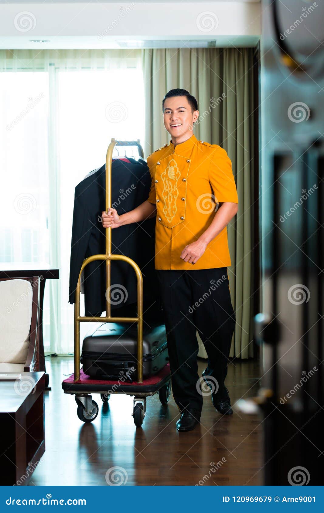 Portrait of Asian Bell Boy Pulling Box Van Stock Image - Image of ...
