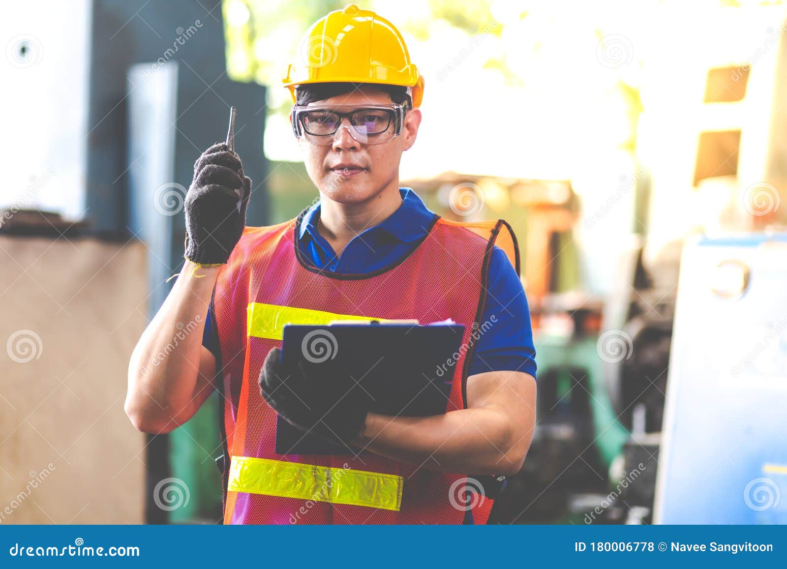 Portrait Asian Engineering Man in an Industrial Manufacturing Facility ...