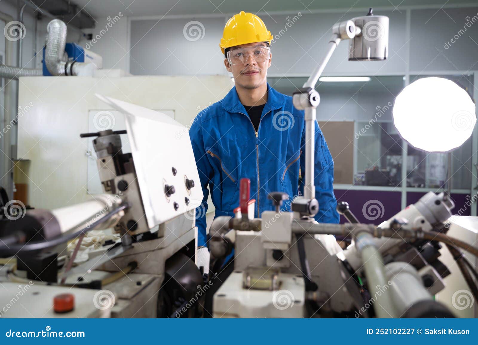 Portrait of Asian Maintenance Engineer Workers Working Machines in the ...