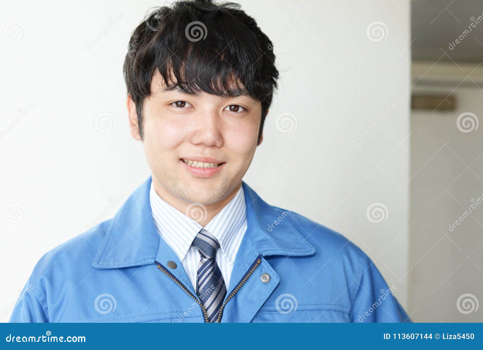 Smiling Asian worker stock photo. Image of handsome - 113607144
