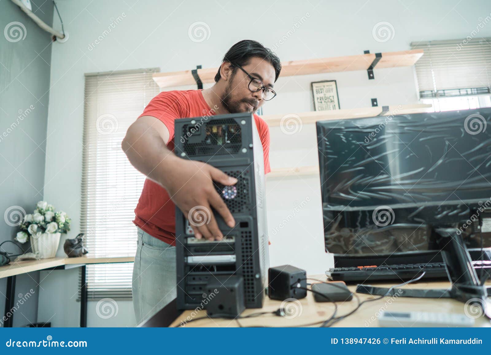 Portrait of Asian Young Man Fix a Problem with Server of Personal ...