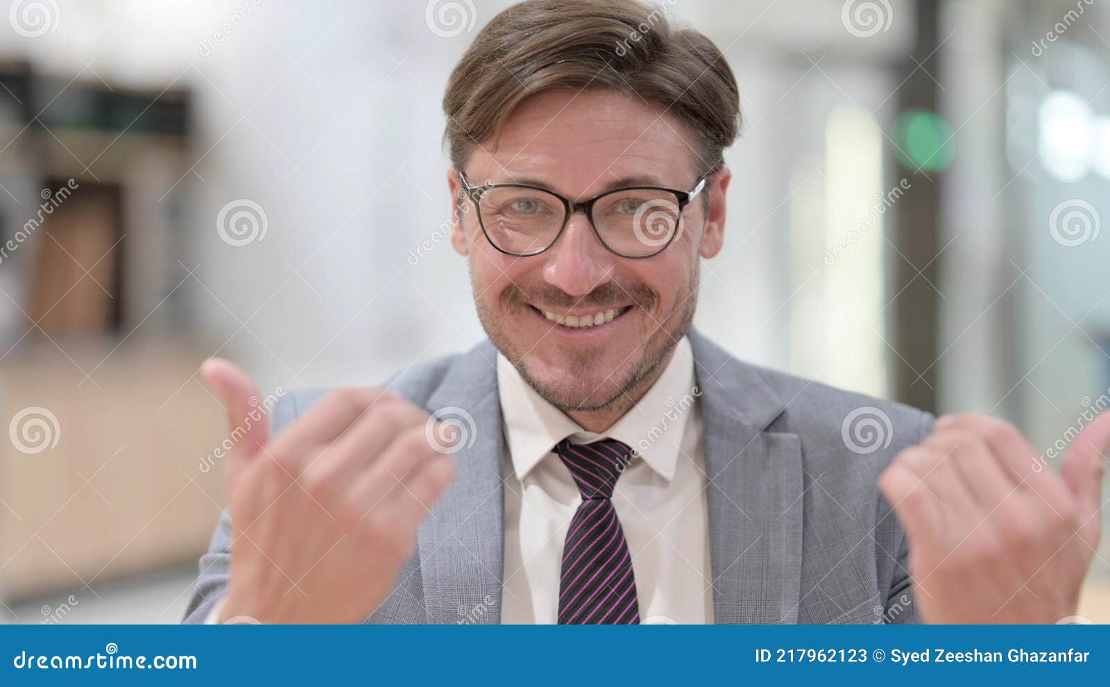 Portrait of Assertive Businessman Inviting Customers Stock Image ...