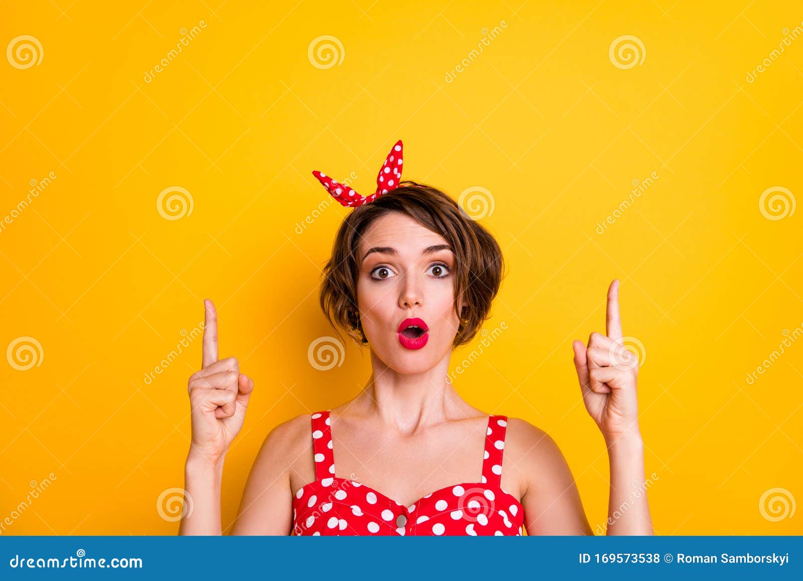 Portrait Of Astonished Crazy Girl Point Index Finger Up Copyspace