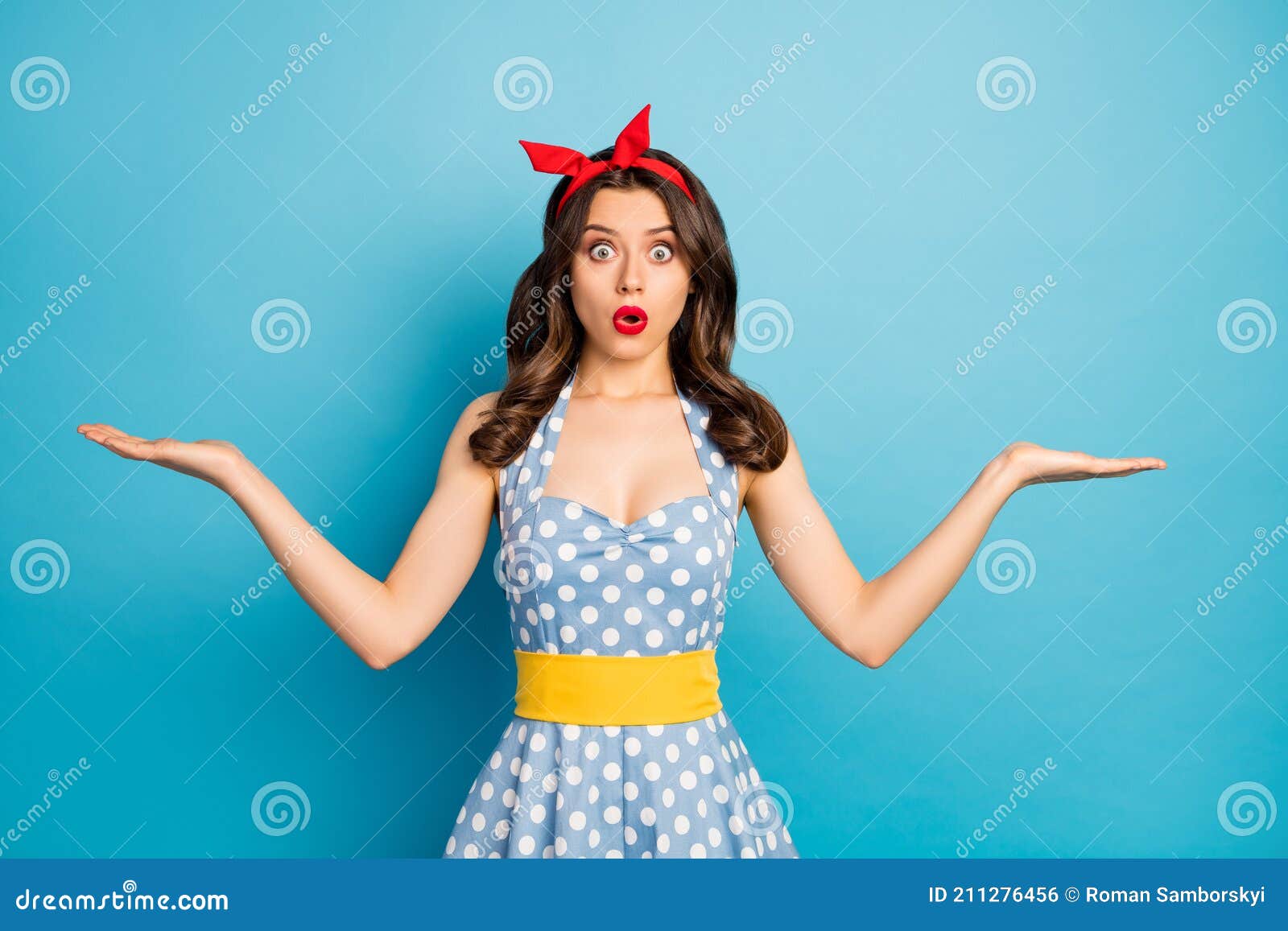Portrait Of Astonished Crazy Girl Promoter Hold Hand Present Discount