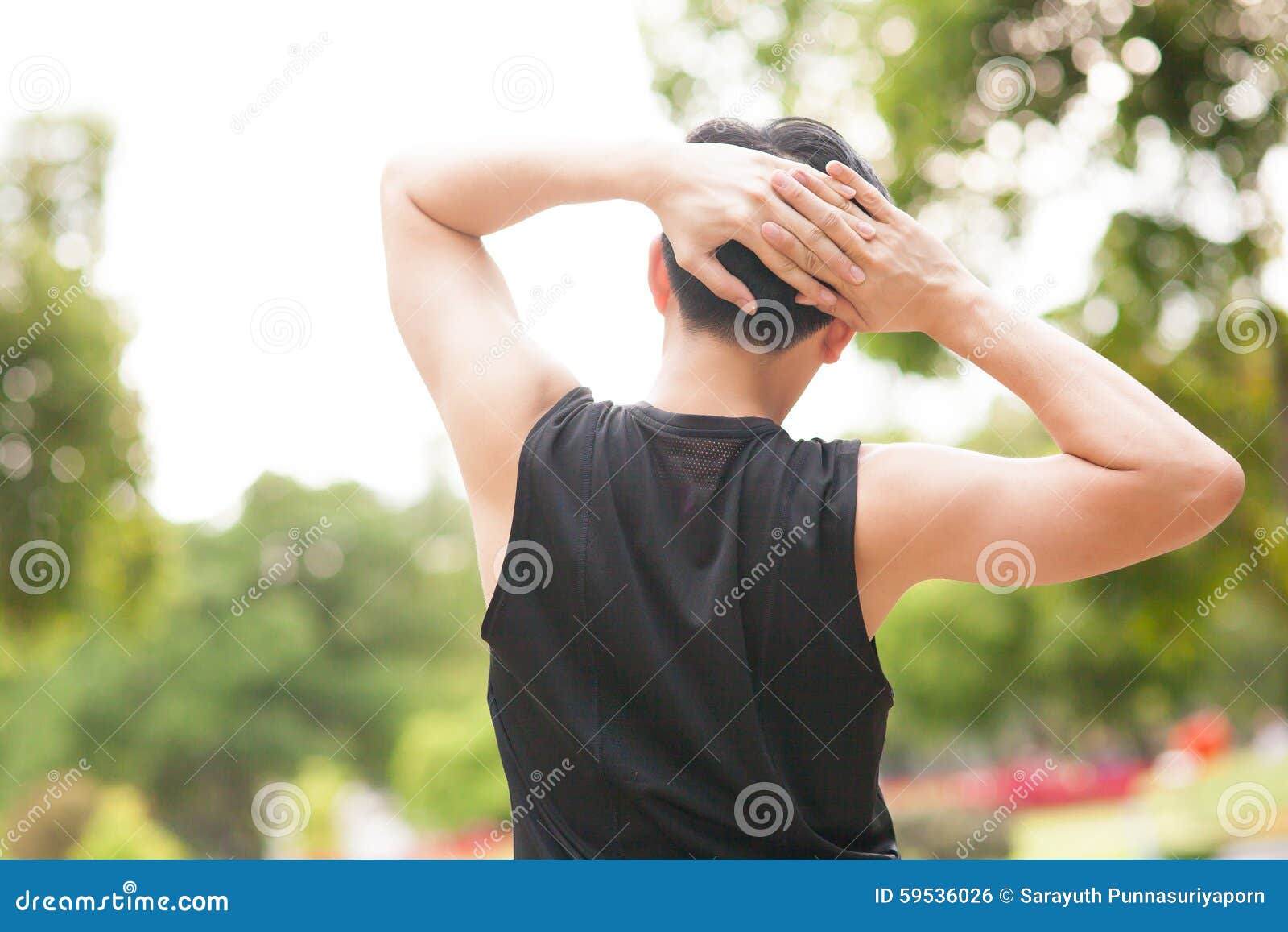 Portrait of Athletic Man Stretching in the Morning and Watching Nice ...
