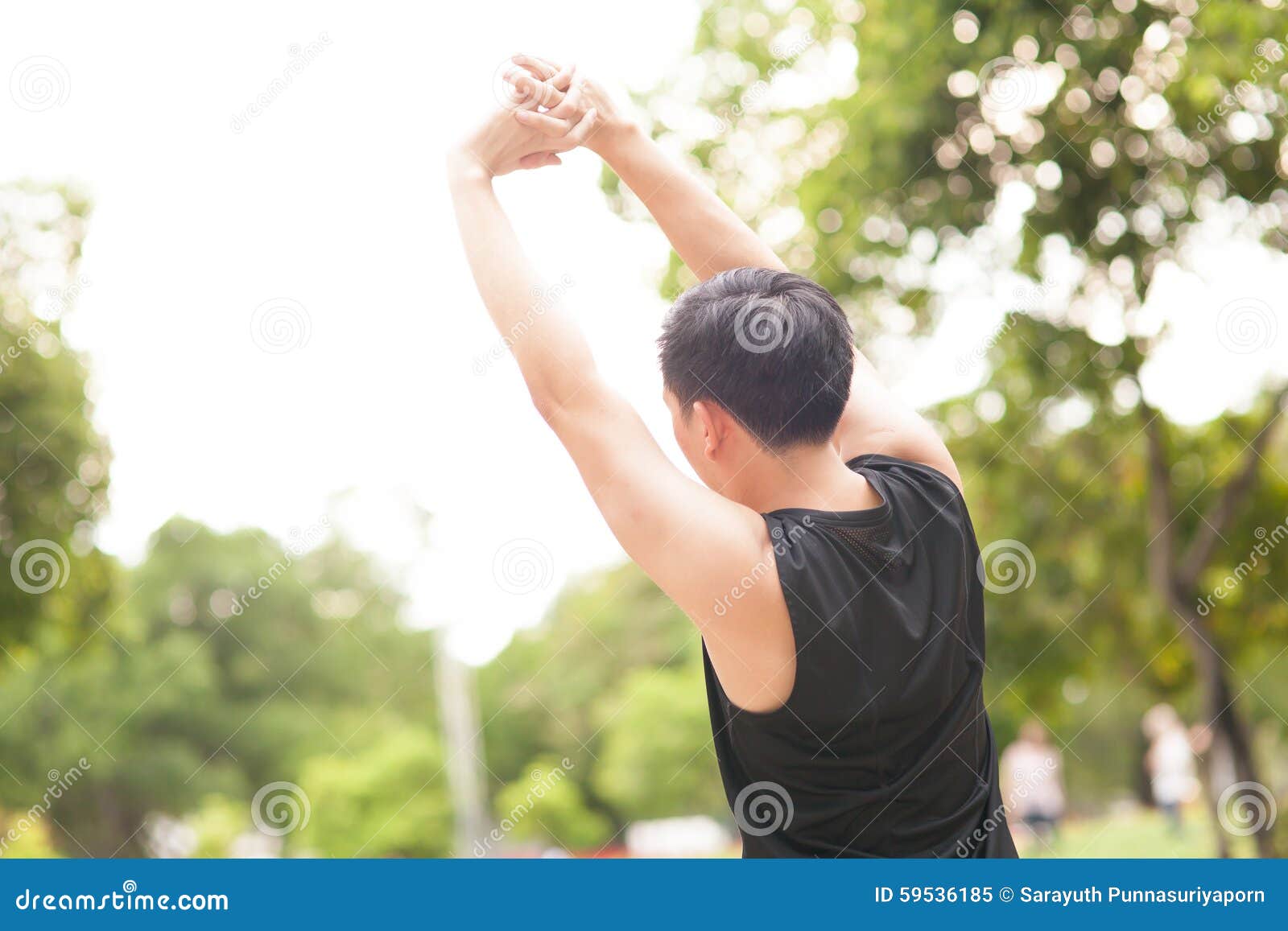 Portrait of Athletic Man Stretching in the Morning and Watching Nice ...