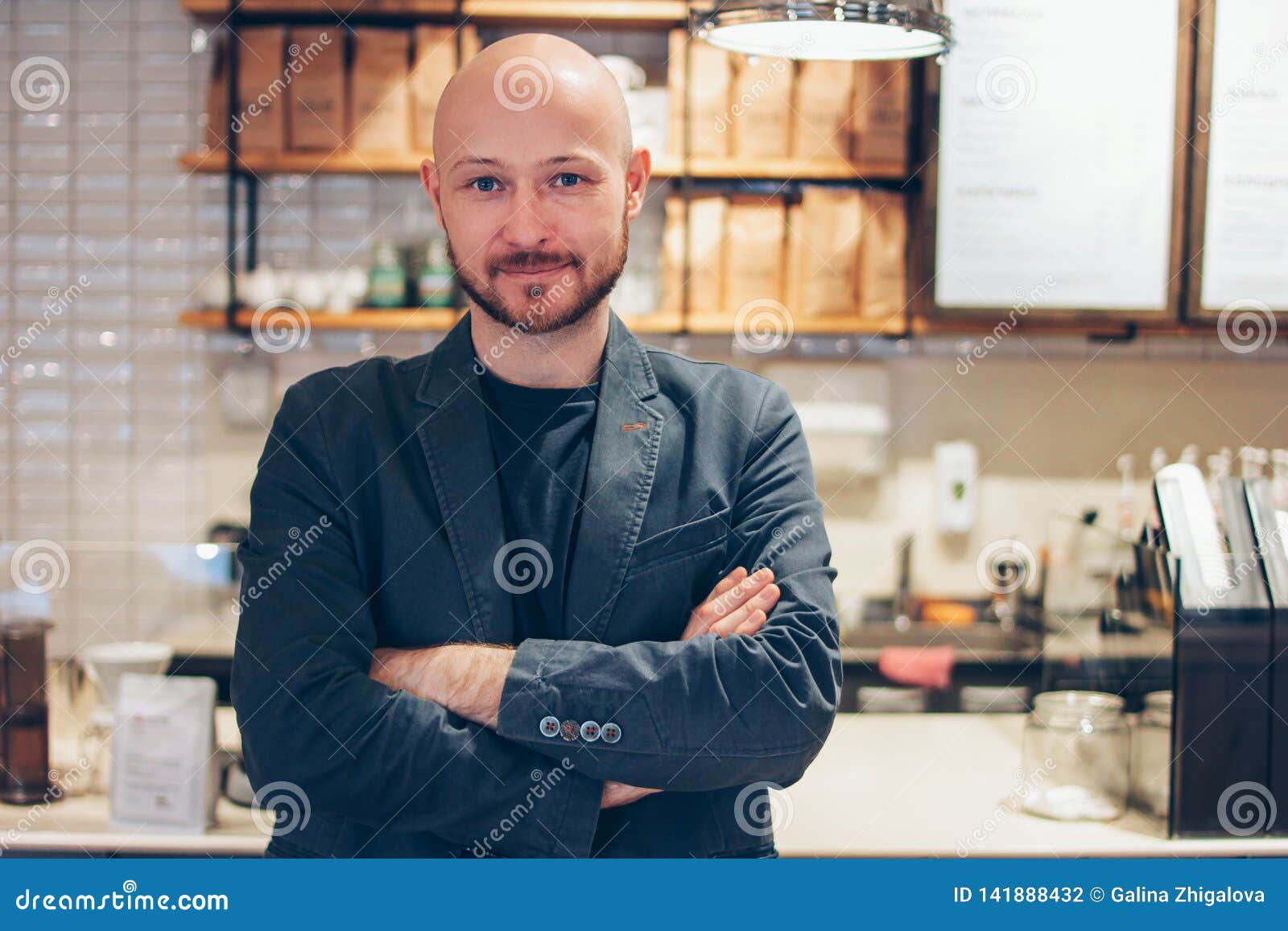 Portrait Of Attractive Adult Successful Bald Bearded Man In Suit On ... Portrait Of Attractive Adult Successful Bald Bearded Man In Suit On ...