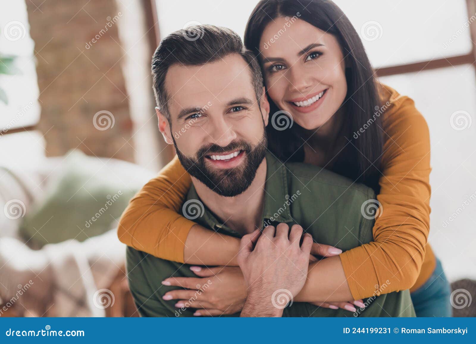 Portrait Of Attractive Amorous Cheerful Couple Hugging Spending Day