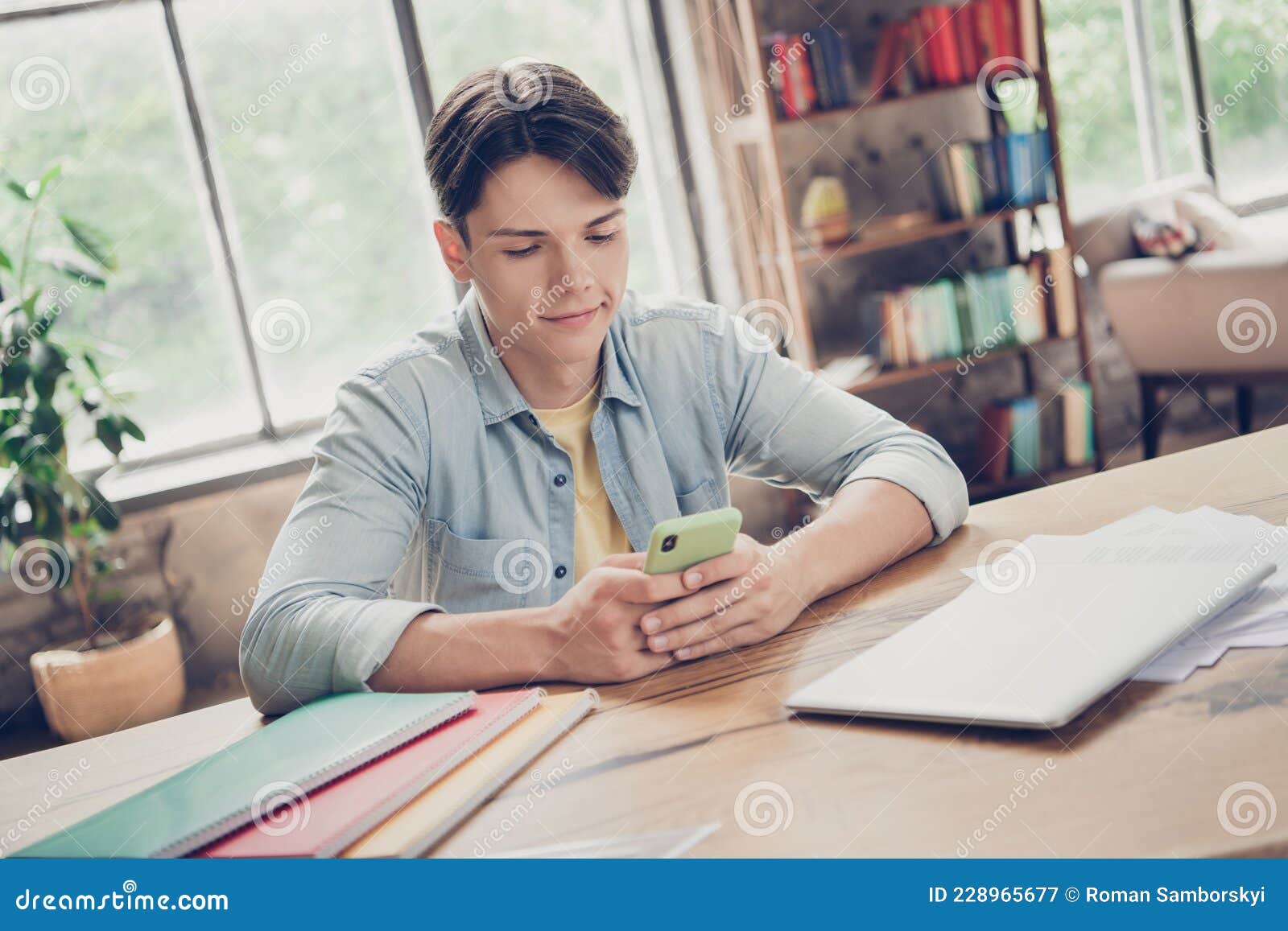 Portrait of Attractive Focused Guy Learner Practicing Using Gadget ...