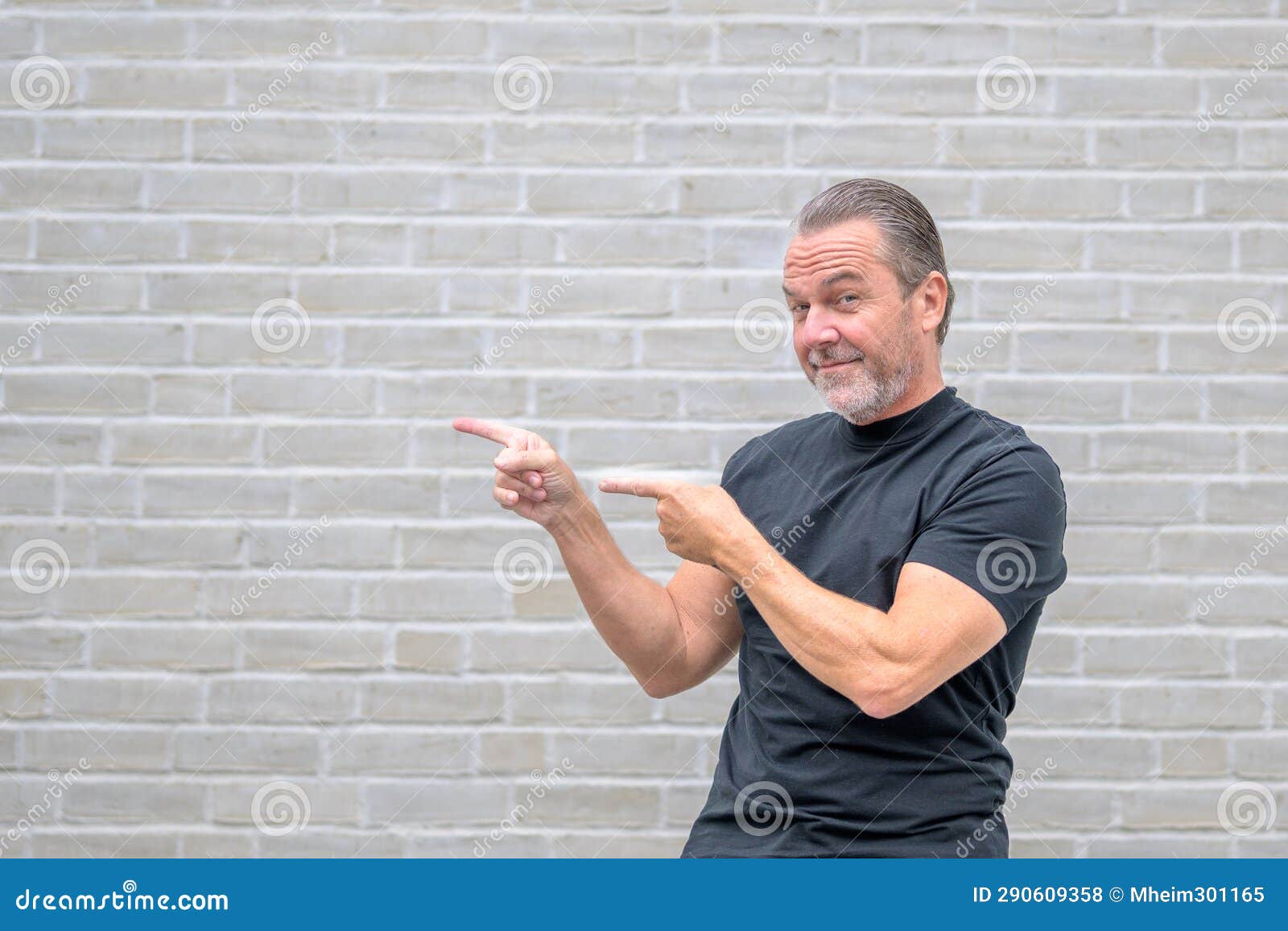 Portrait of an Attractive Friendly Man Pointing To the Left Side Stock ...
