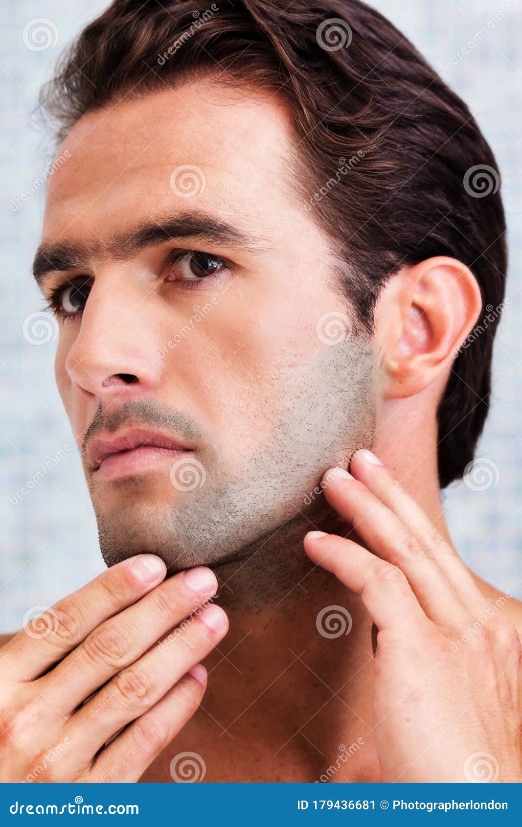 Portrait of Attractive Man Checking His Face in the Mirror Stock Image ...