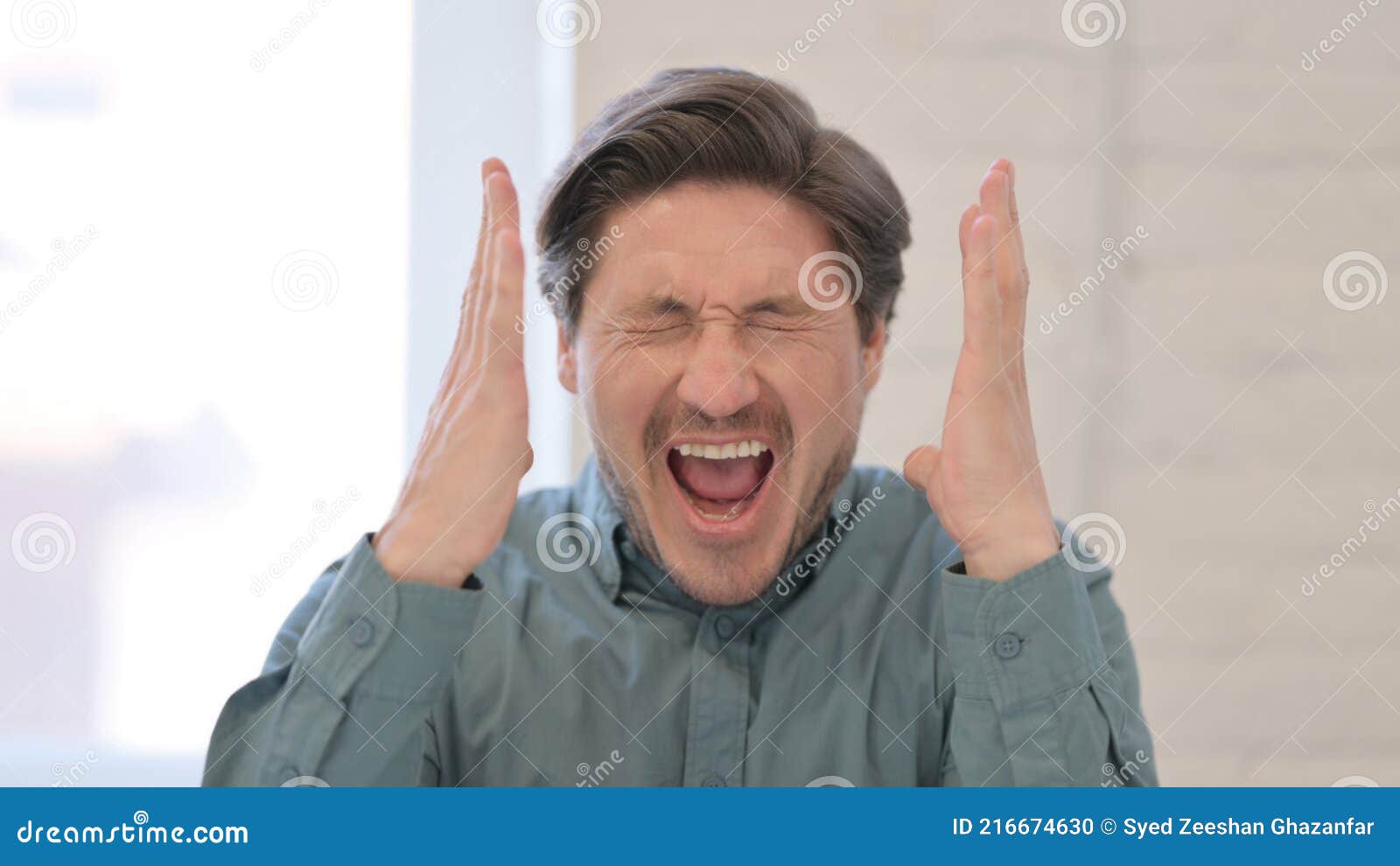 Portrait of Attractive Middle Aged Man Screaming, Shouting Stock Photo ...