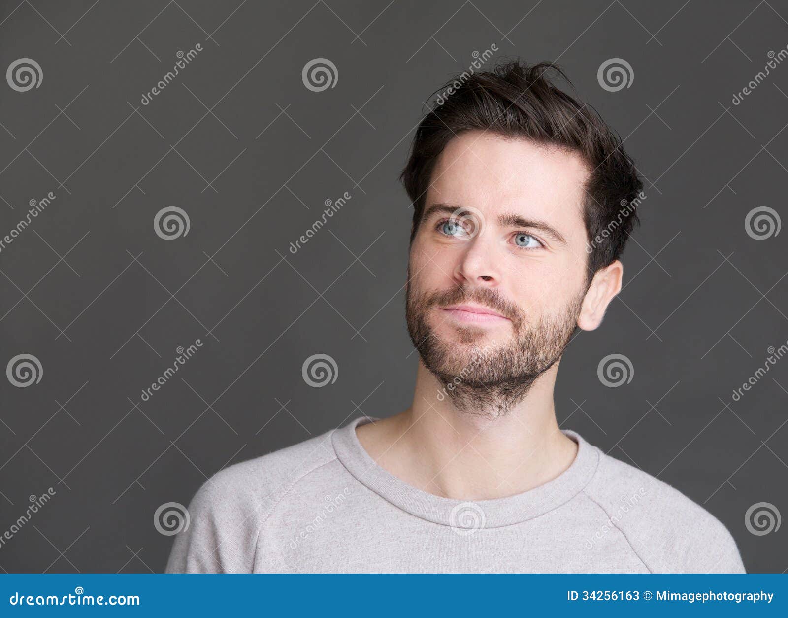 Portrait of an Attractive Young Man with Beard Looking Away Stock Image ...