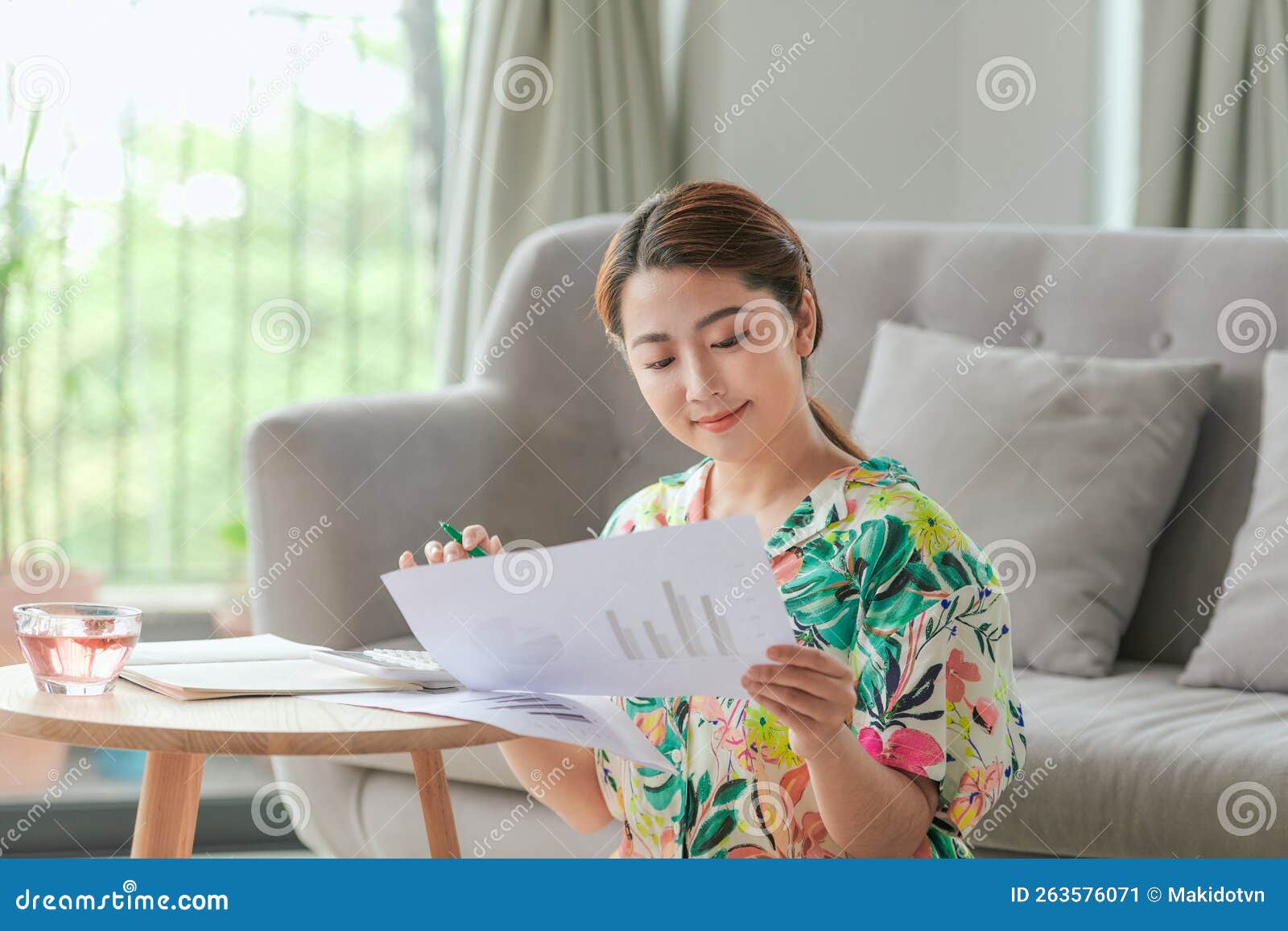 Portrait of an Attractive Young Student Doing Her Homework at Hom Stock ...