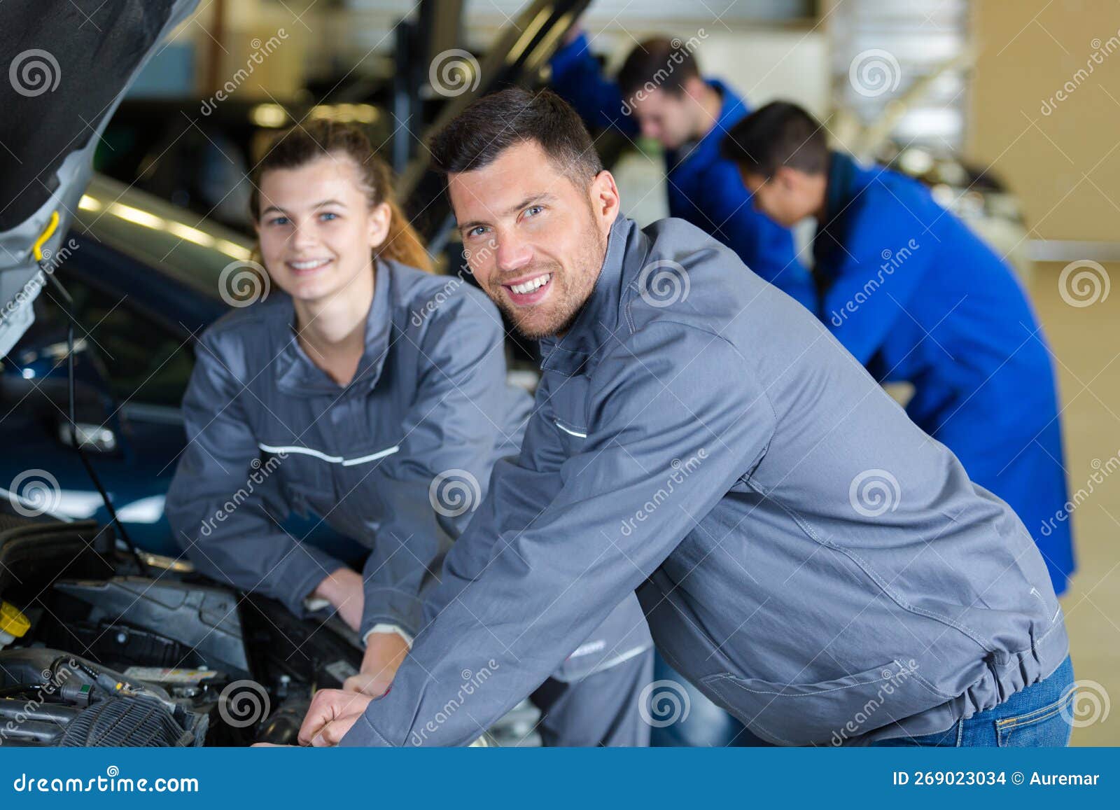 Portrait Automotive Mechanic with Female Apprentice Stock Photo - Image ...