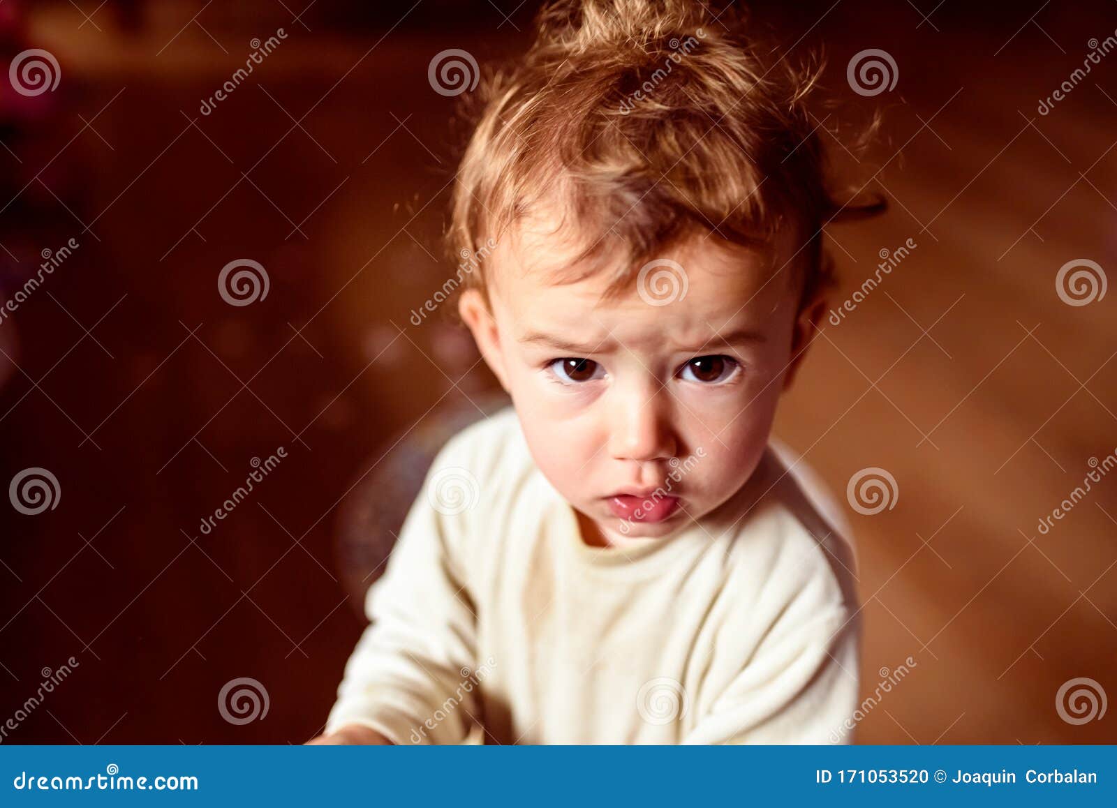 Portrait of a Baby with Intense Expression Stock Photo - Image of ...
