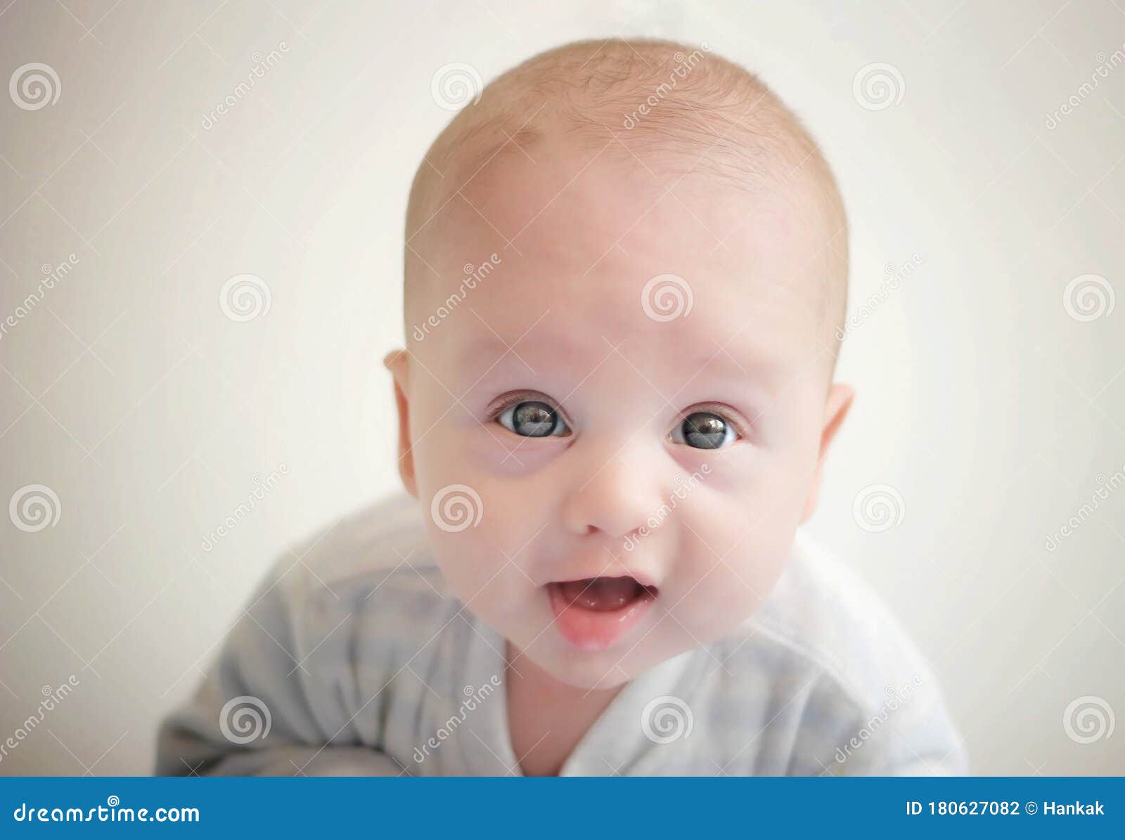 Portrait of a Baby Who is Having Tummy Time Stock Photo - Image of ...