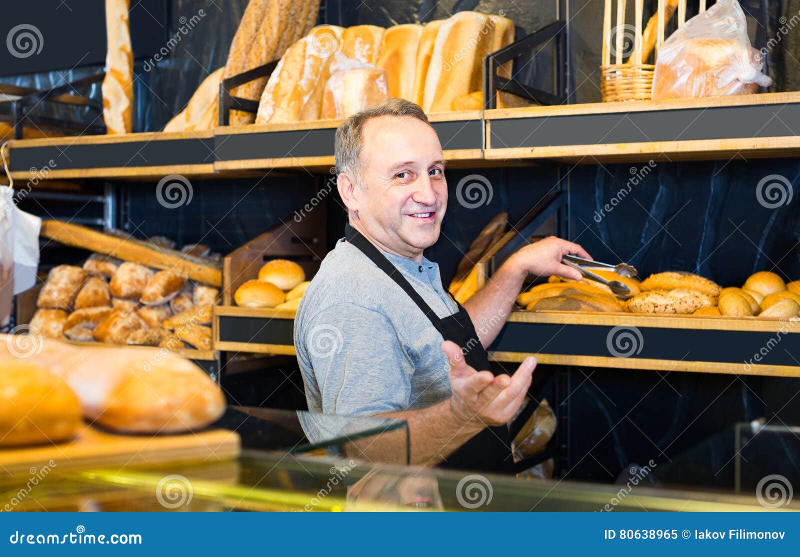 Portrait of Baker with Fresh Bread Smiling in Bakery Stock Image ...