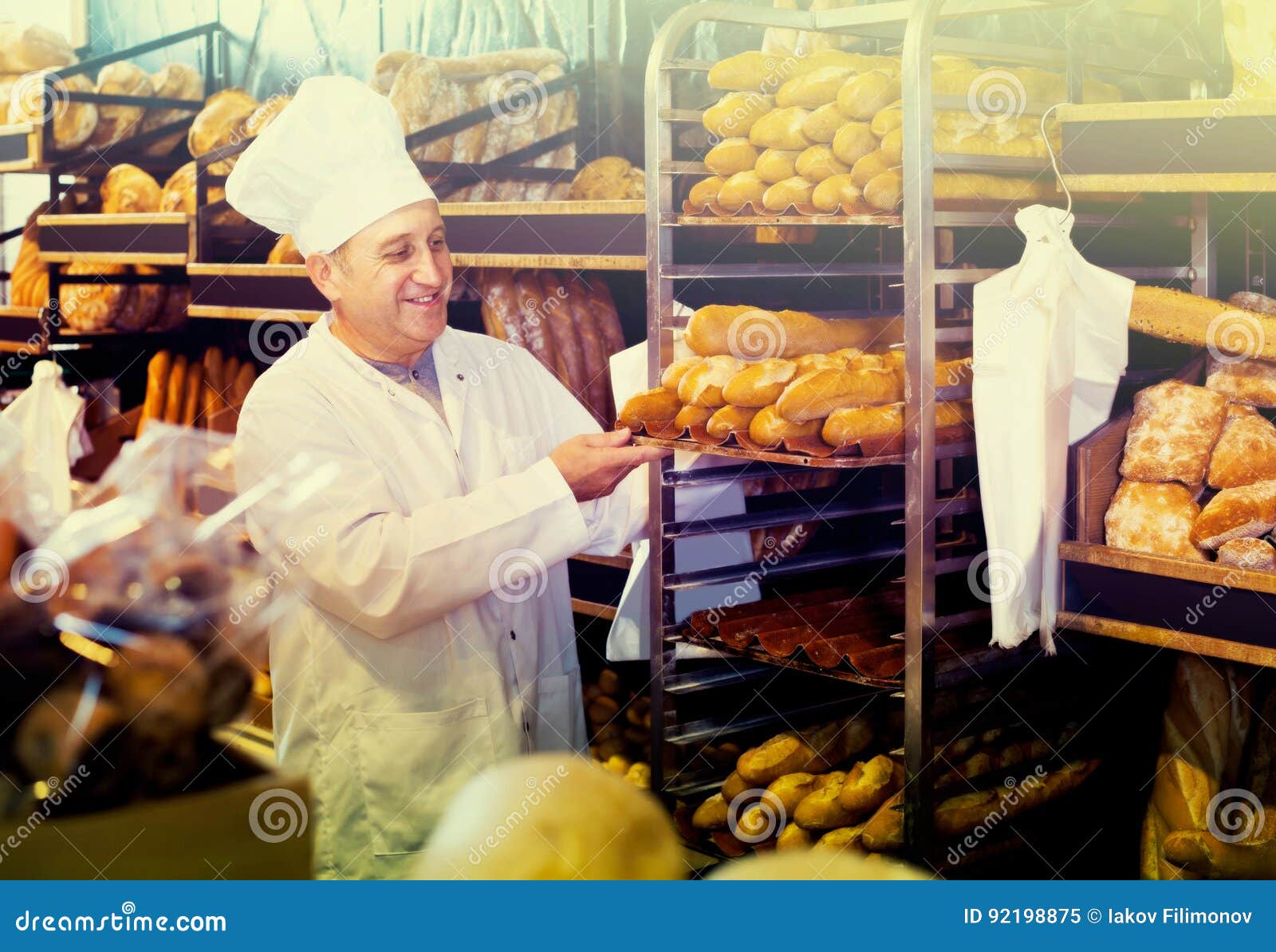 Portrait of Baker with Fresh Bread Smiling in Bakery Stock Image ...