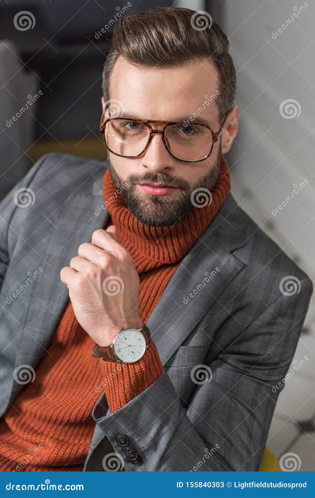 Portrait Of Bearded Man In Formal Wear And Glasses Looking Stock Image