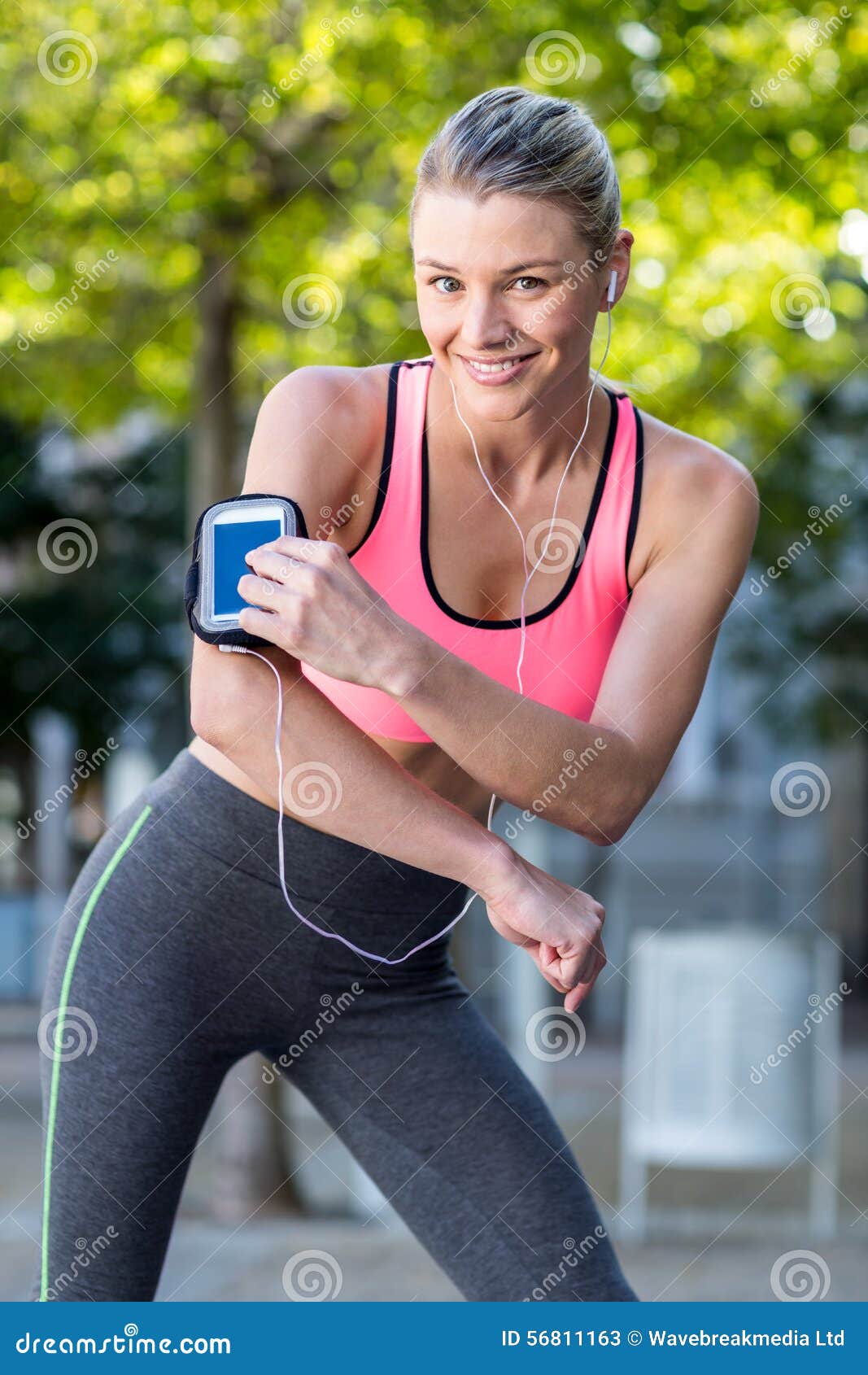Portrait of a Beautiful Athlete Using Her Phone Stock Image - Image of ...