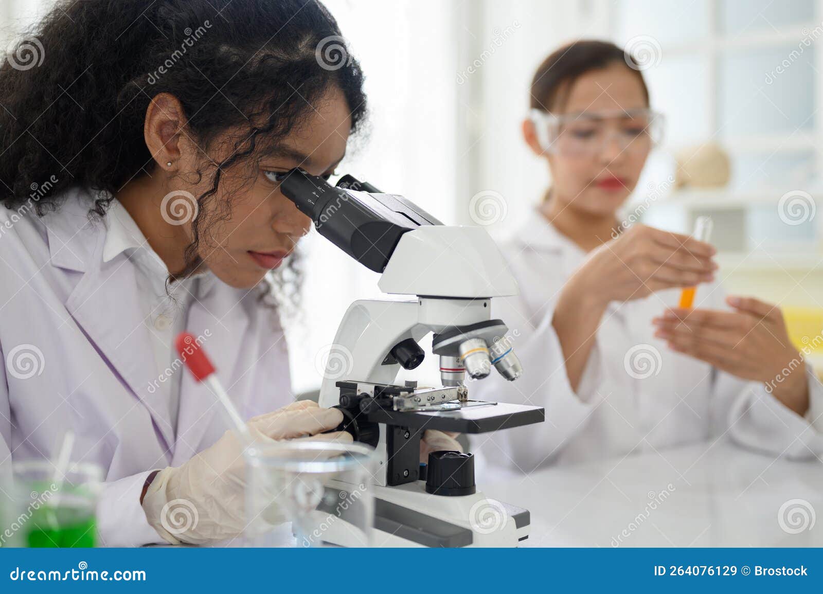 Portrait of Beautiful Black Scientist Looking Under Microscope Stock ...