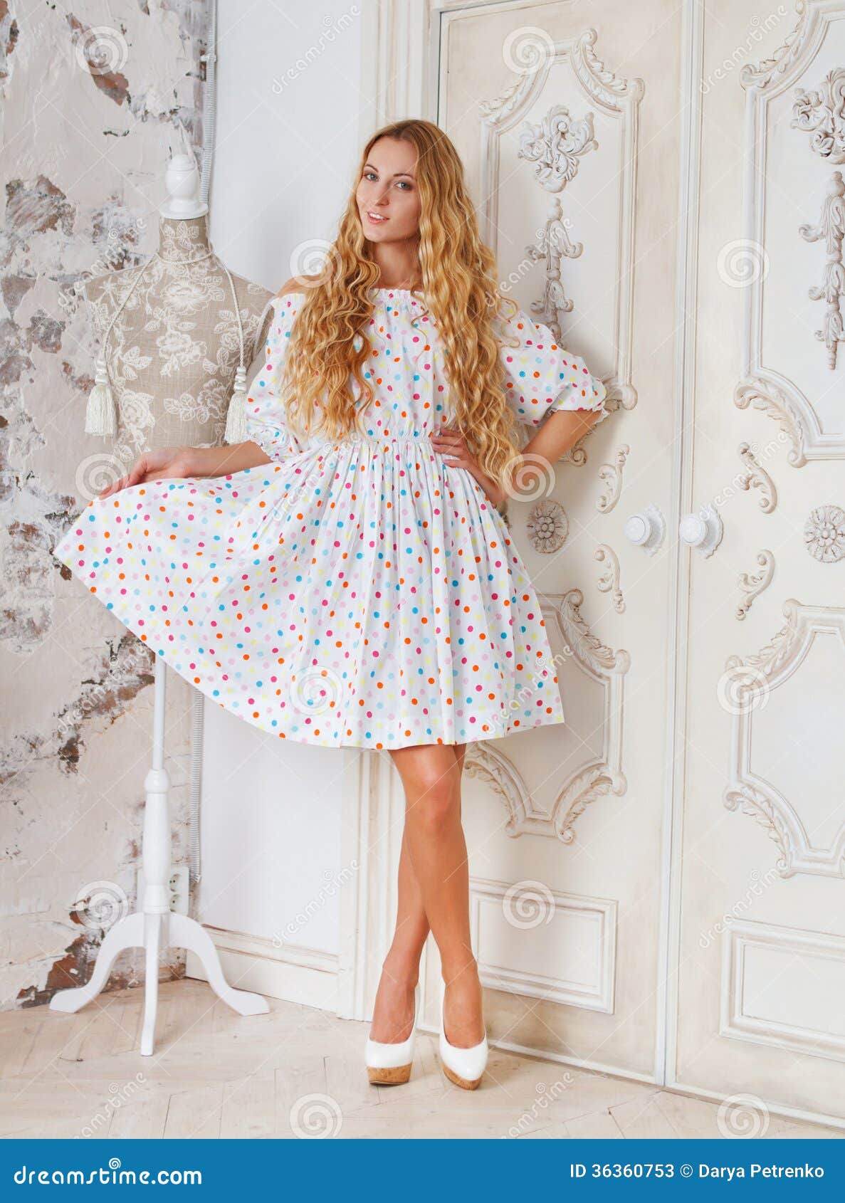 Portrait Of The Beautiful Blond Girl In Polka Dots Dress Stock Image