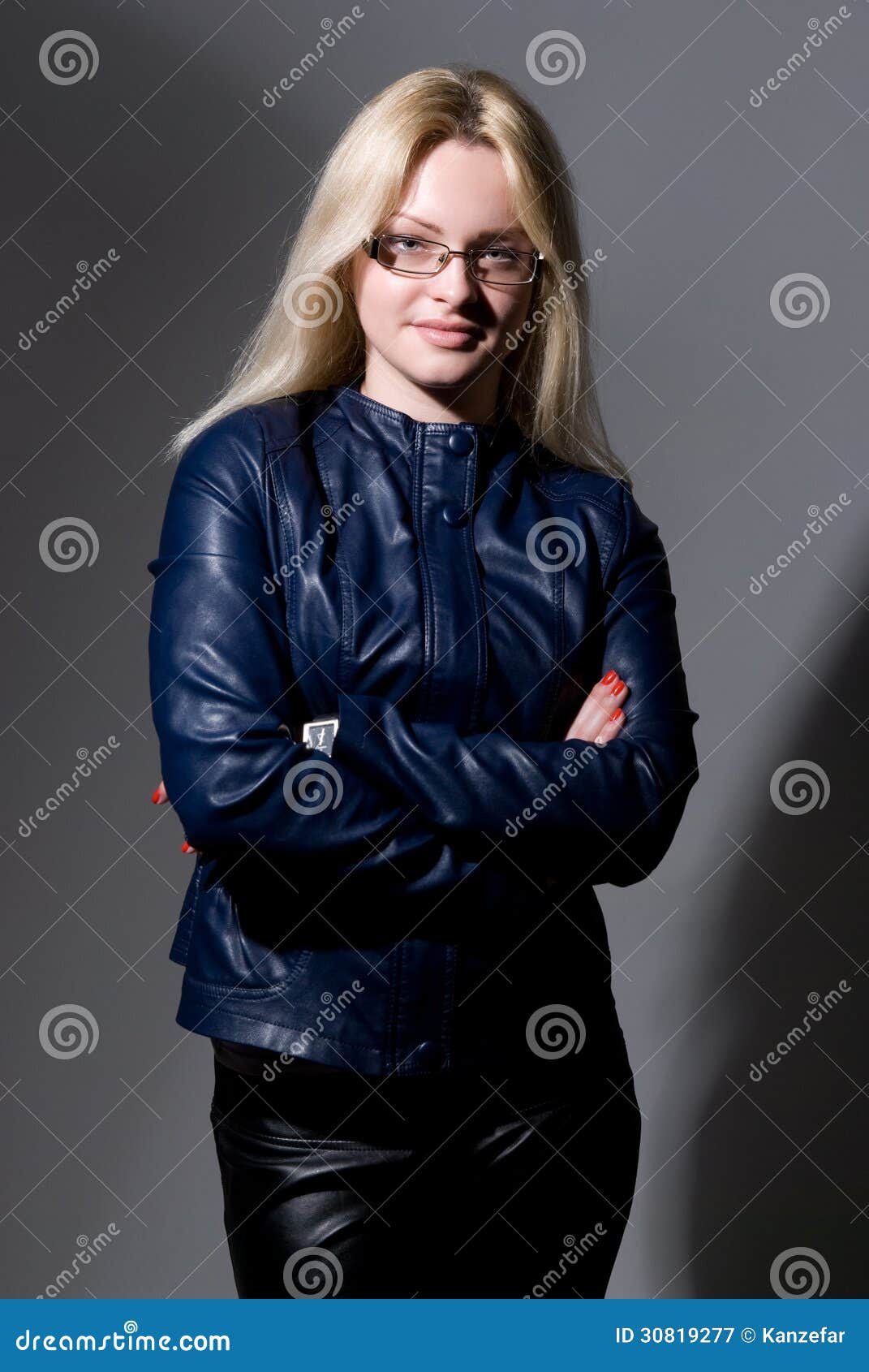 Portrait Of A Beautiful Blonde In A Cute Leather Jacket Stock Image