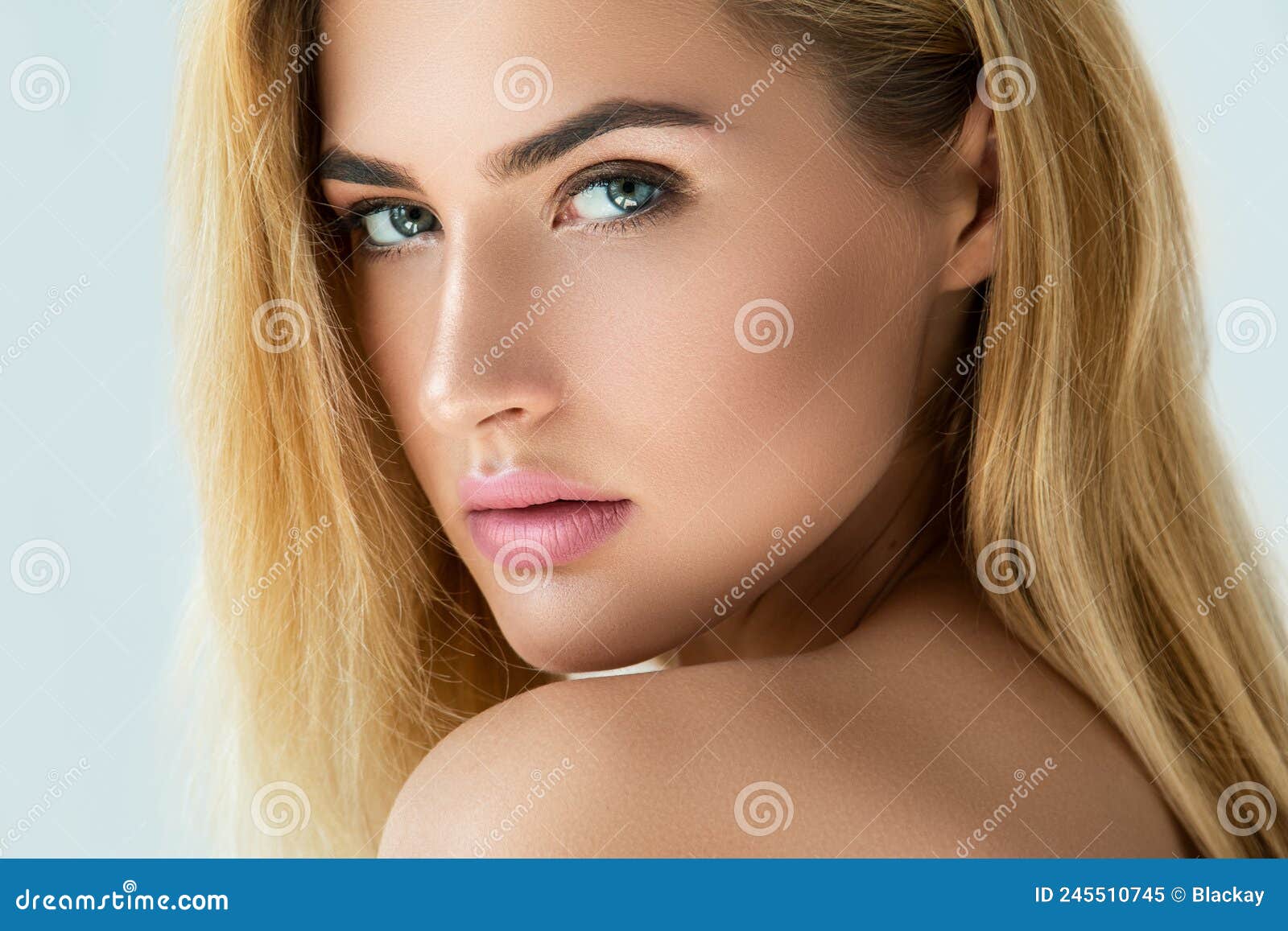 Portrait Of Beautiful Blonde Girl With Beautiful Eyes Stock Image