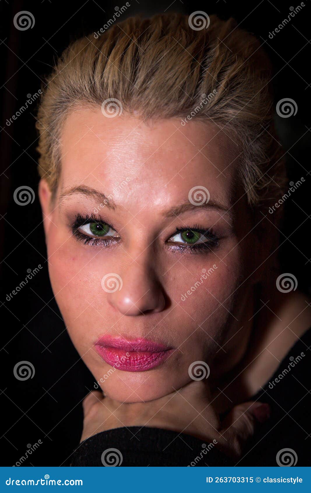 Portrait Of A Beautiful Blonde Woman With Green Eyes Stock Image