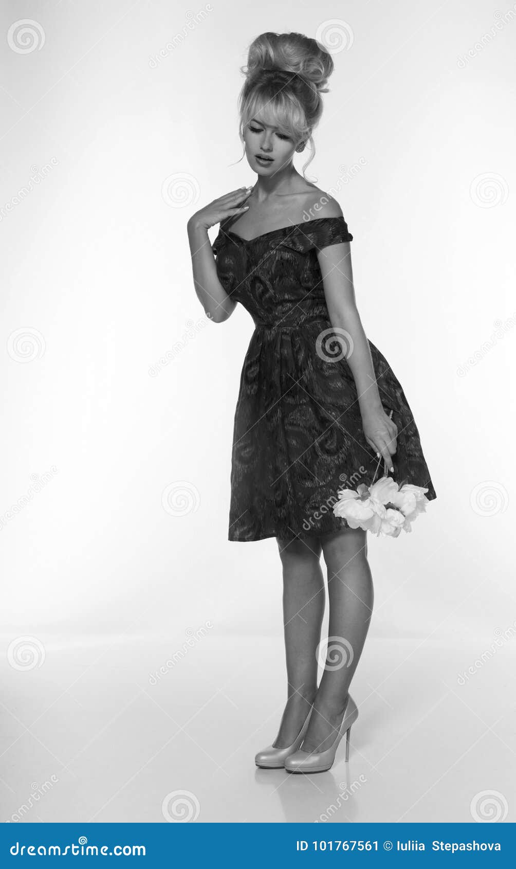 Portrait Of A Beautiful Blonde Woman In Retro Dress 50 S Style