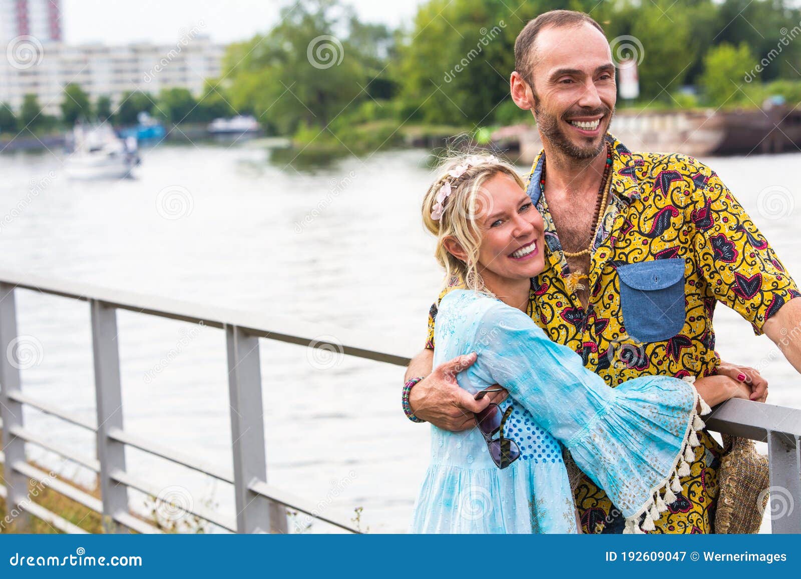 Portrait of Beautiful Couple in Their 40s Outdoors by a River Stock ...