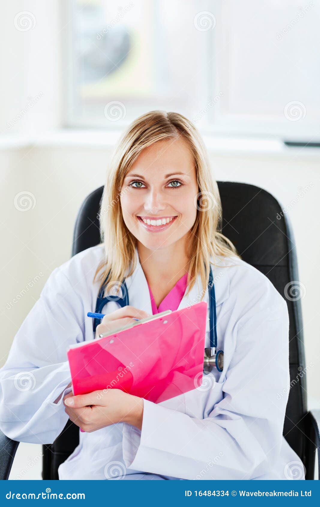Portrait of a Beautiful Doctor Writing Stock Photo - Image of beautiful ...
