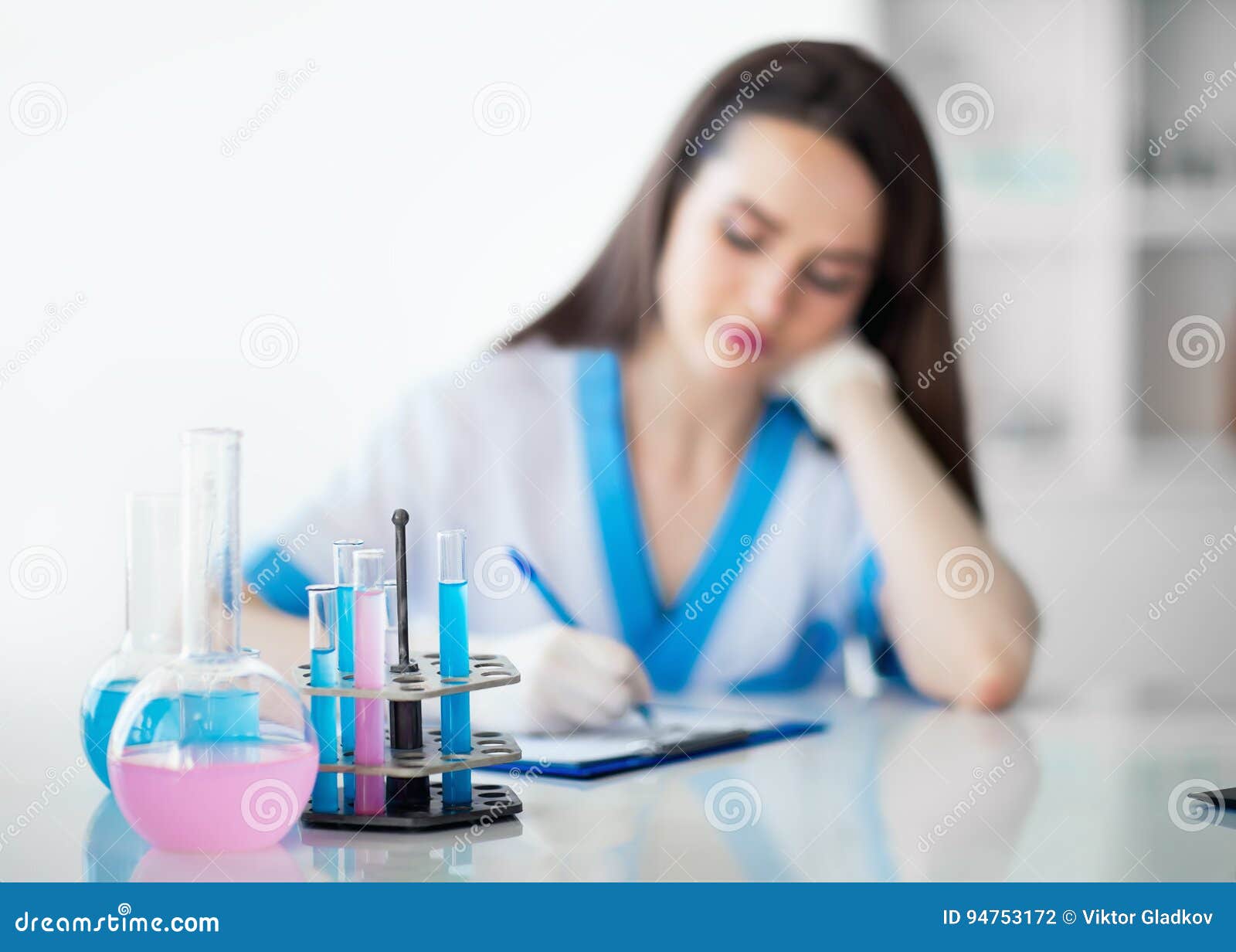 Portrait of Beautiful Female Scientist Writing Notes Stock Photo ...